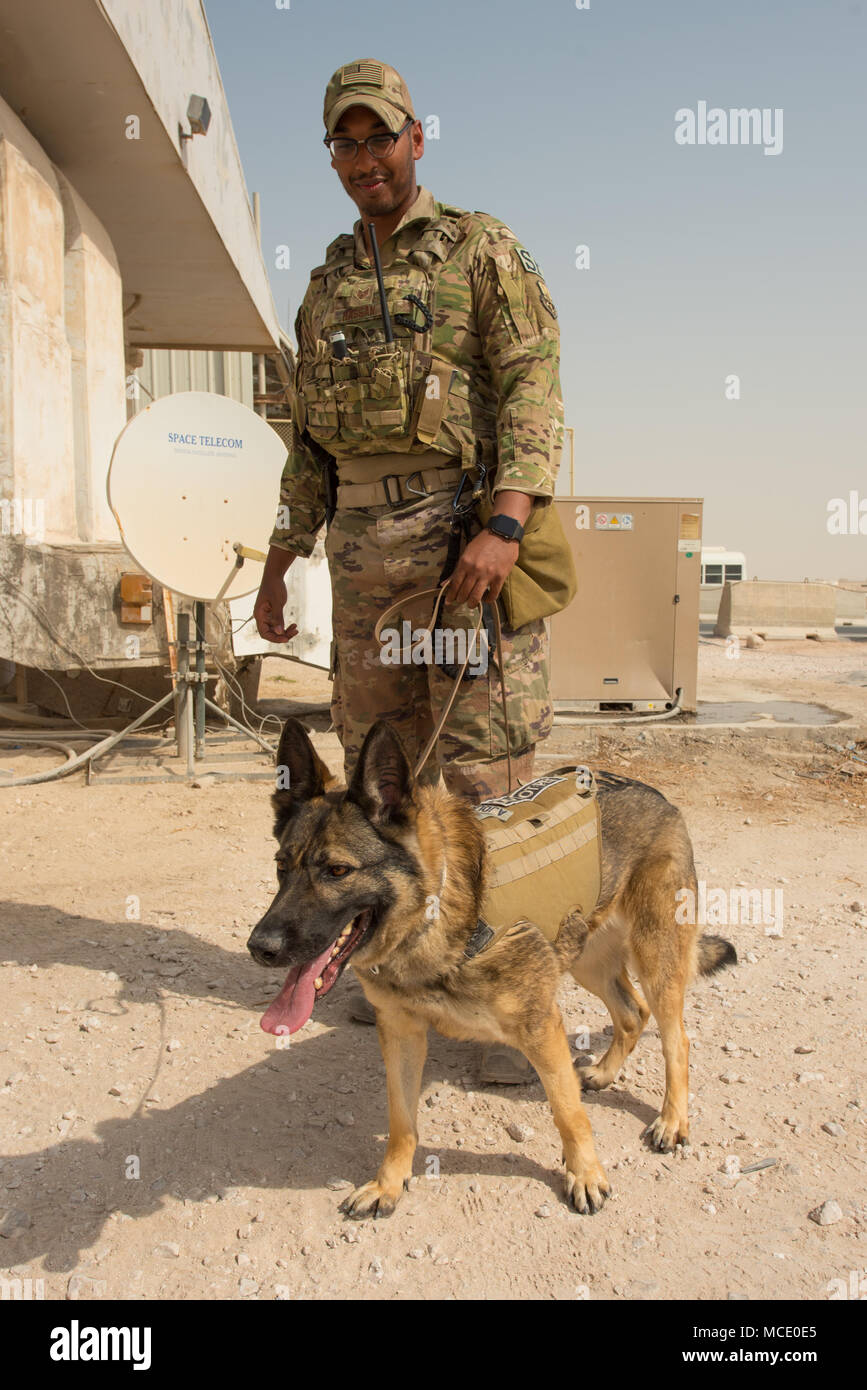 Staff Sgt. Jaafar Hassan, a dog handler for the 379th Expeditionary ...