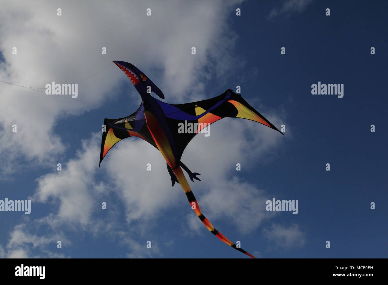 Kite in the Clouds Stock Photo - Alamy