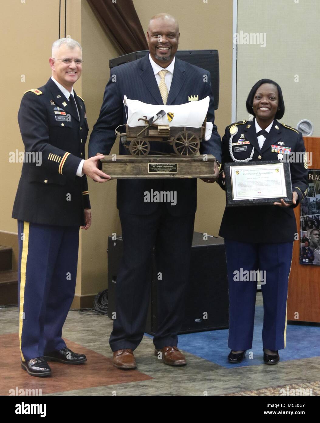 From left: Col. Steven Carozza, commander, 1st Cavalry Division ...