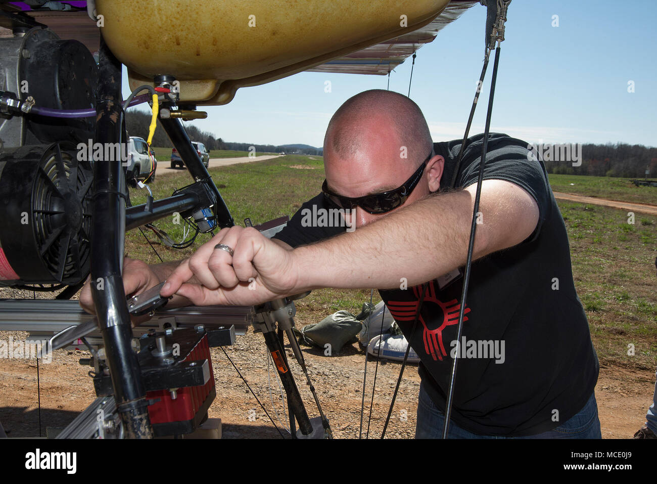 Derek Buckley, a member of Team Kirtland, repairs a broken electrical ...