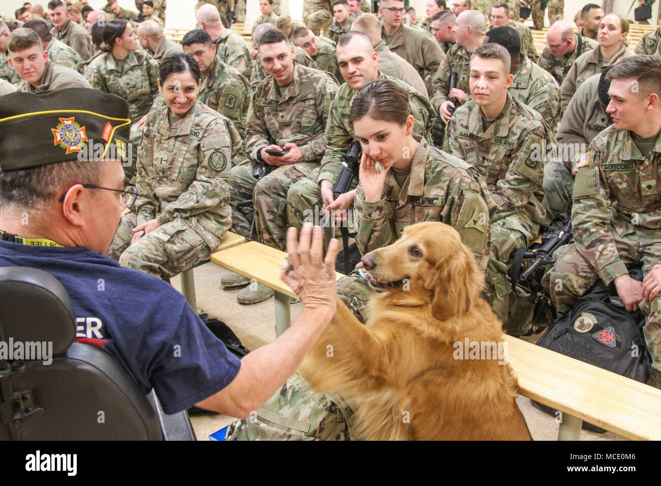 Kerry A. Welch, a representative from the USO at Fort Hood, Texas gets ...