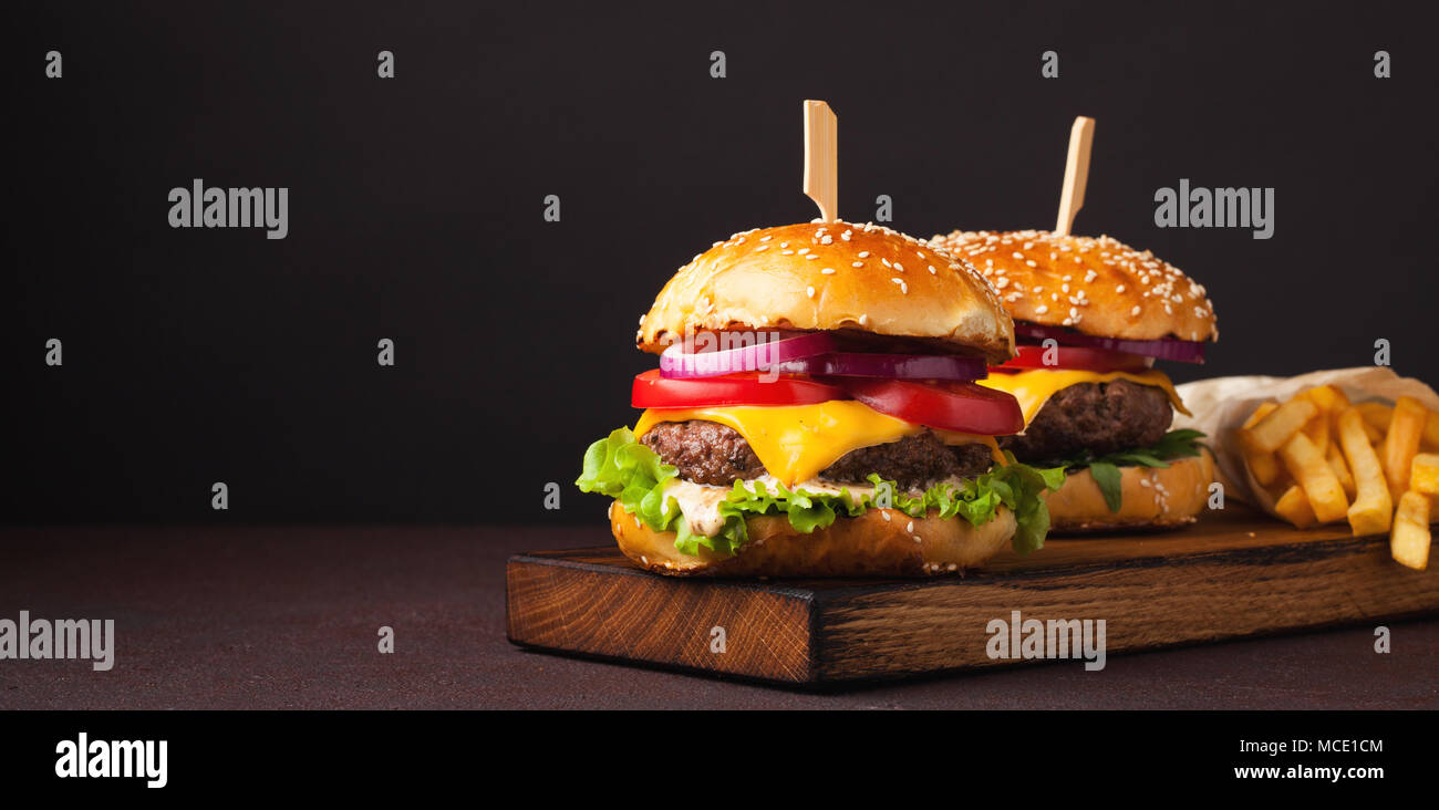 Close-up of delicious fresh home made burger with lettuce, cheese ...