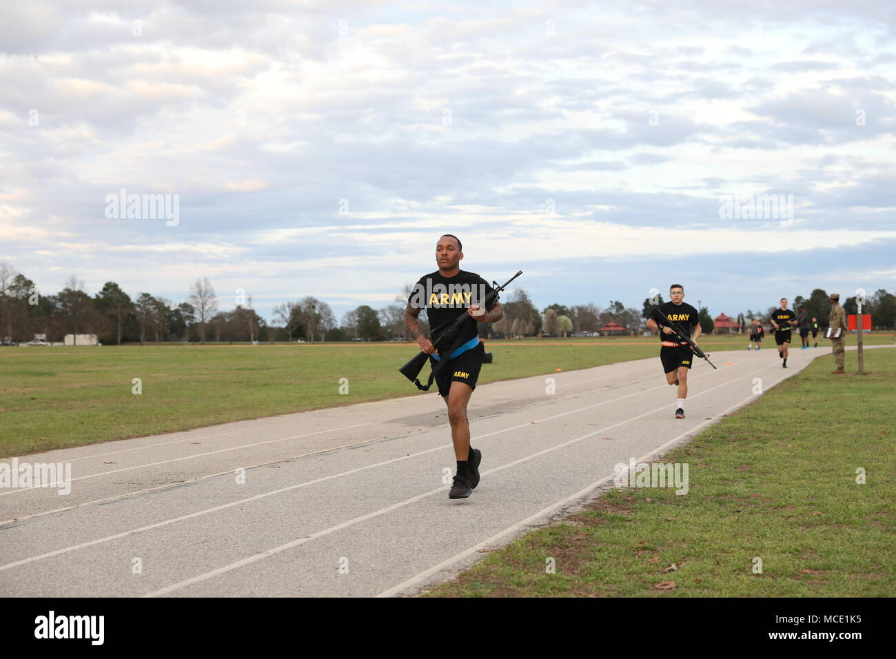 U.S. Army Best Warrior competitors conduct the modified 2-mile fun ...