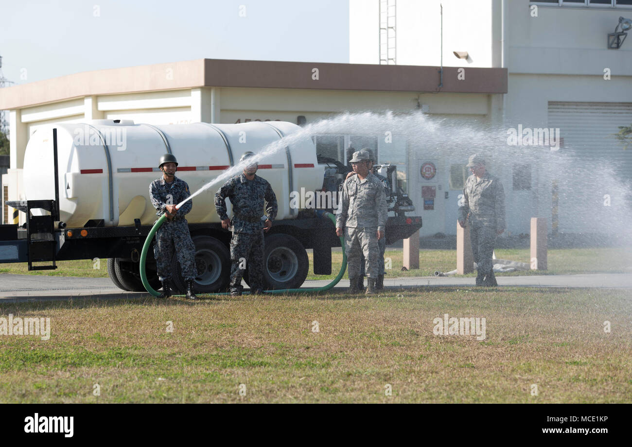 U.S. Air Force Airmen from the 18th Civil Engineer Squadron help train ...