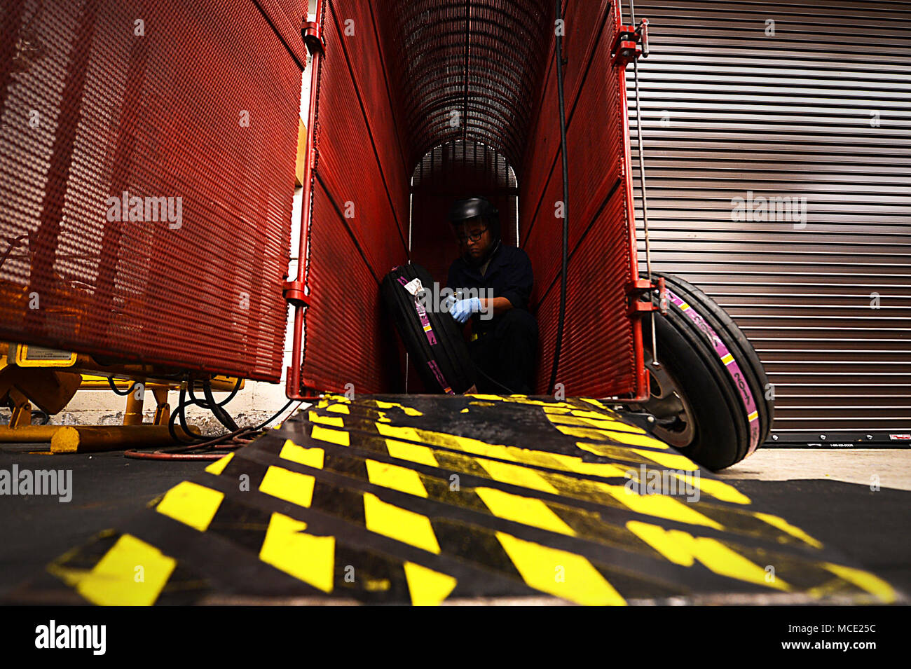 Tire safety cage hi-res stock photography and images - Alamy