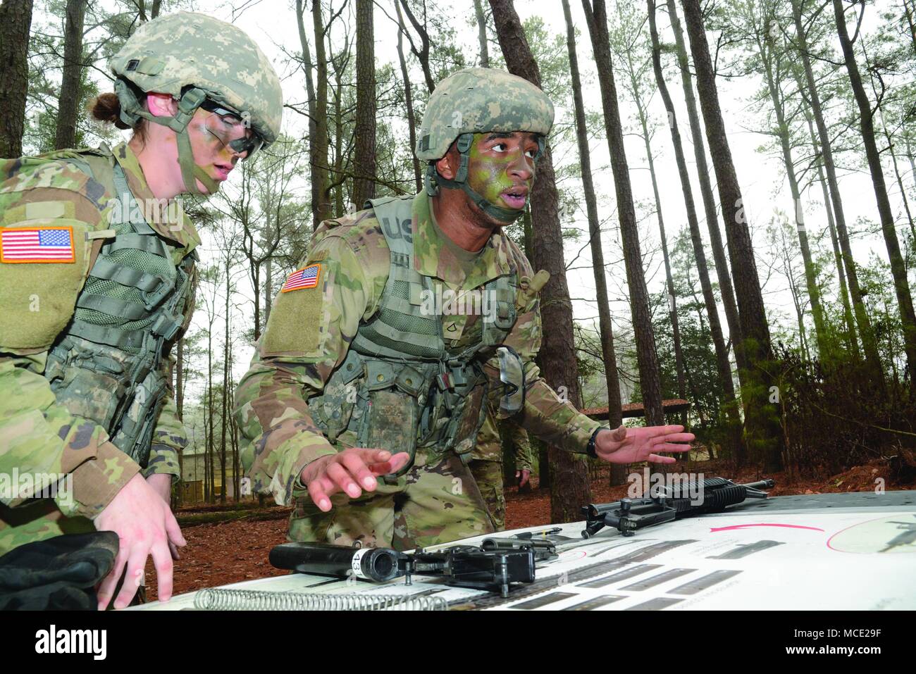 After disassembling an M16 rifle with help from battle buddy Pfc ...