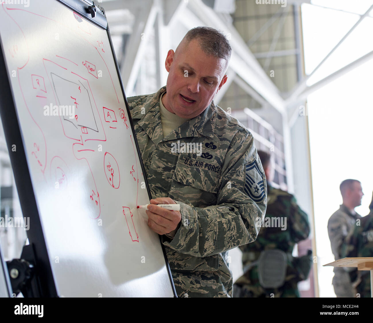 U.S. Air Force Senior Master Sgt. Jon Pieters, right, an emergency ...