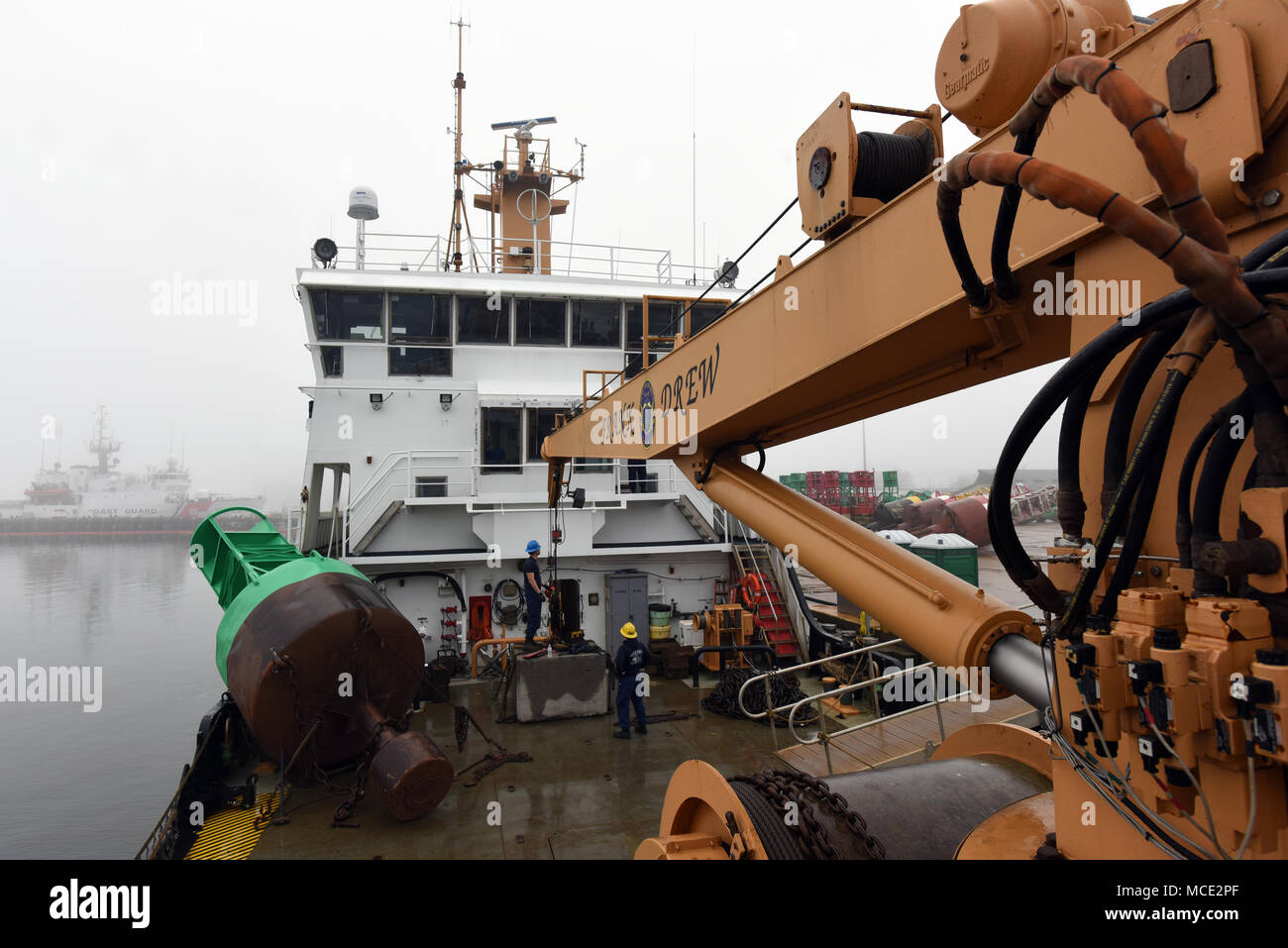 Crew members prepare to get underway aboard Coast Guard Cutter Frank ...