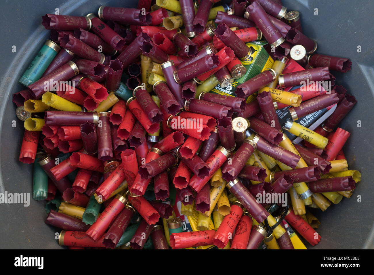 Expended shotgun shells are seen in a garbage can on the Skeet and Trap ...