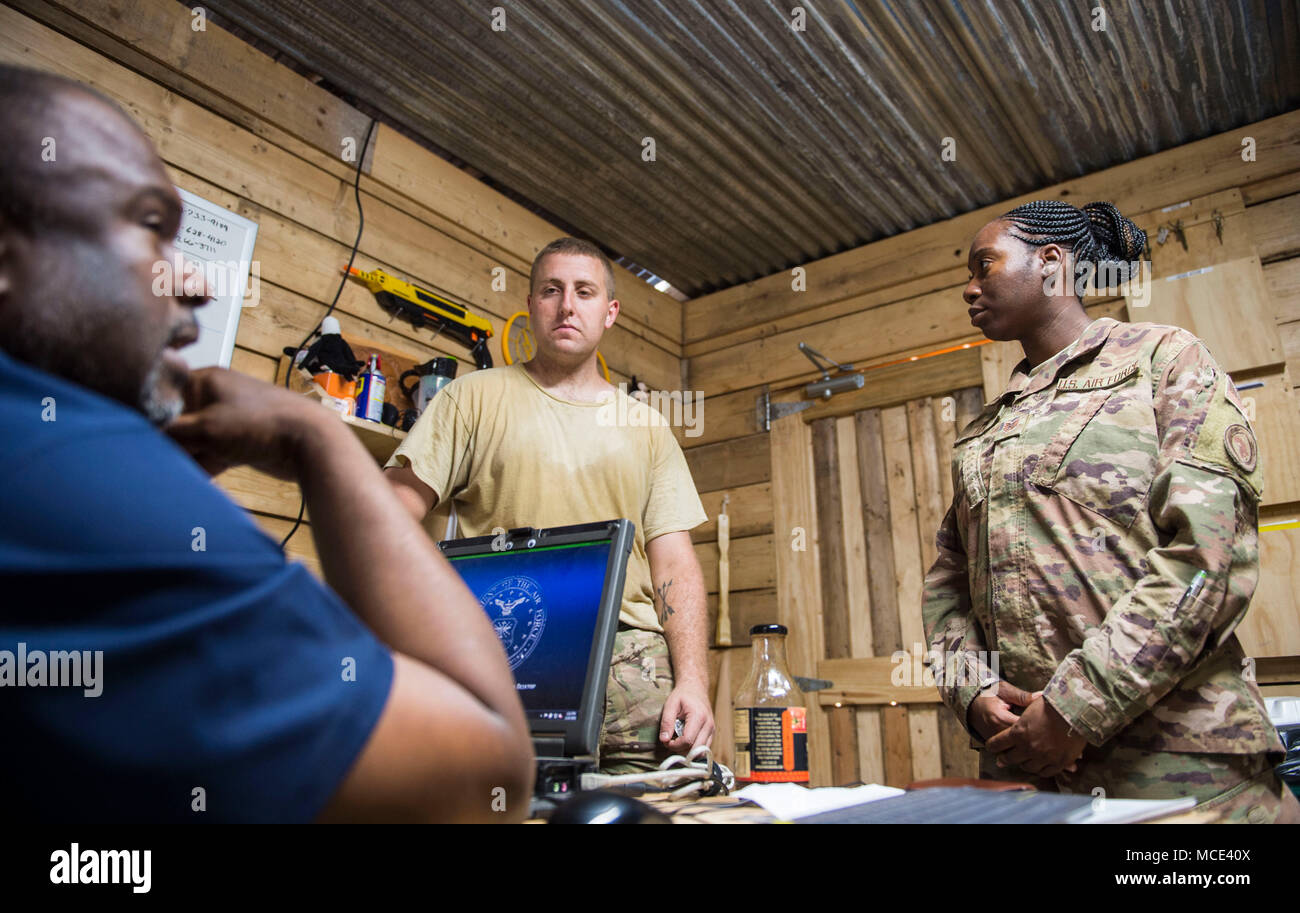 U.S. Air Force Tech. Sgt. Starr Day, right, assistant inspector general ...