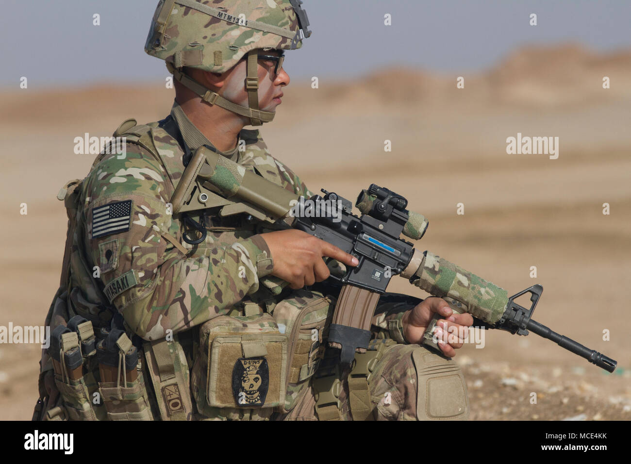 Specialist Matthew Miyasaki, a cannon crewmember, 3rd Platoon, Delta ...