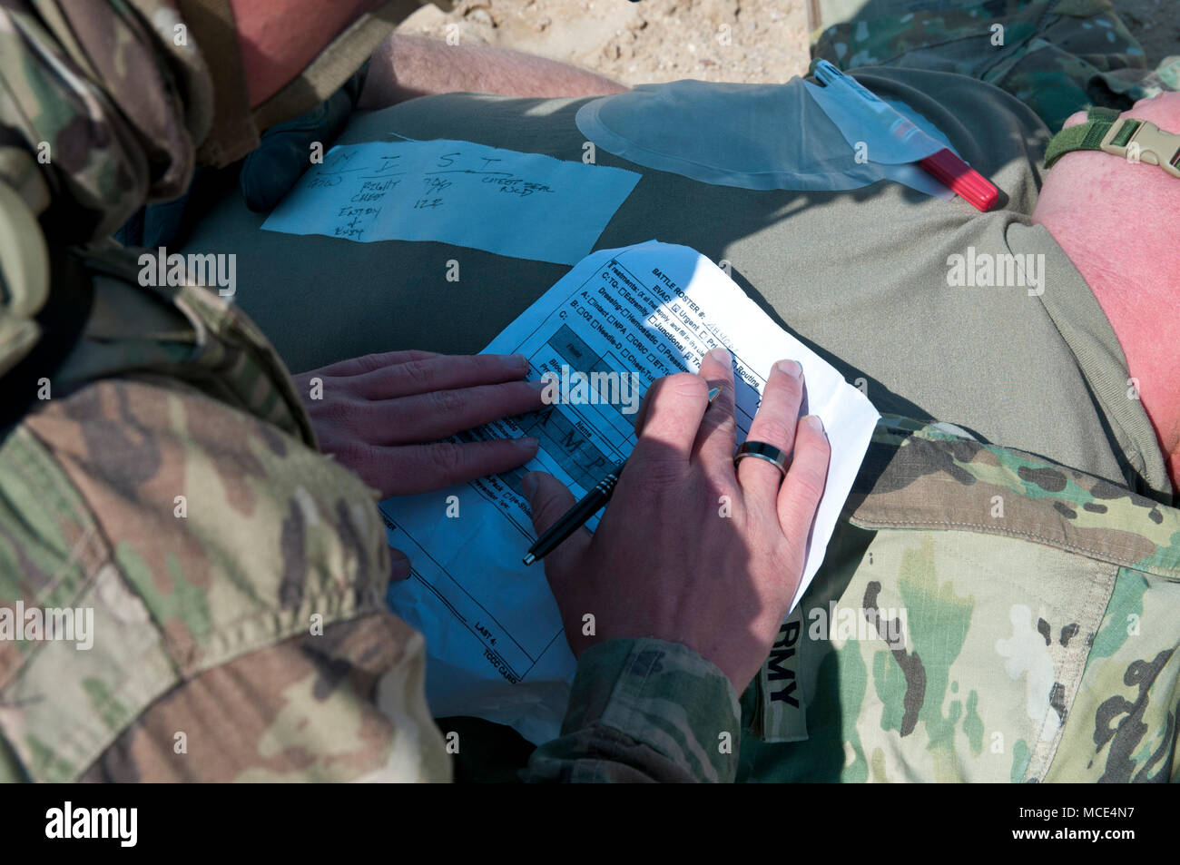 An Army combat lifesaver from Delta Battery, 1st Battalion, 145th Field ...