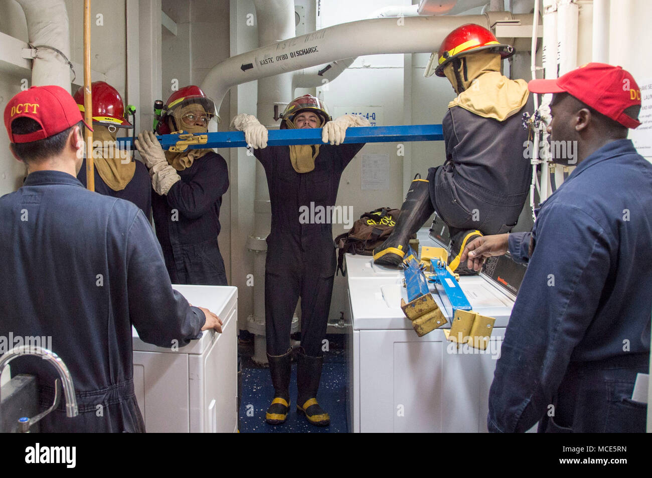 180228-N-DC385-064 GULF OF THAILAND (Feb. 28, 2018) Sailors secure ...