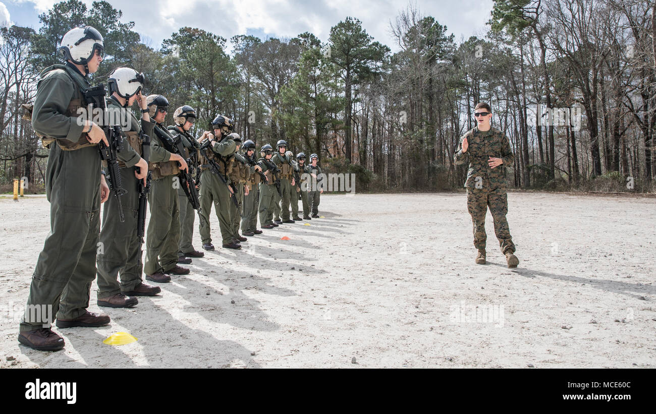U.S. Marine Corps Sgt. Dustin C. Shankle, right, instructs Marines ...