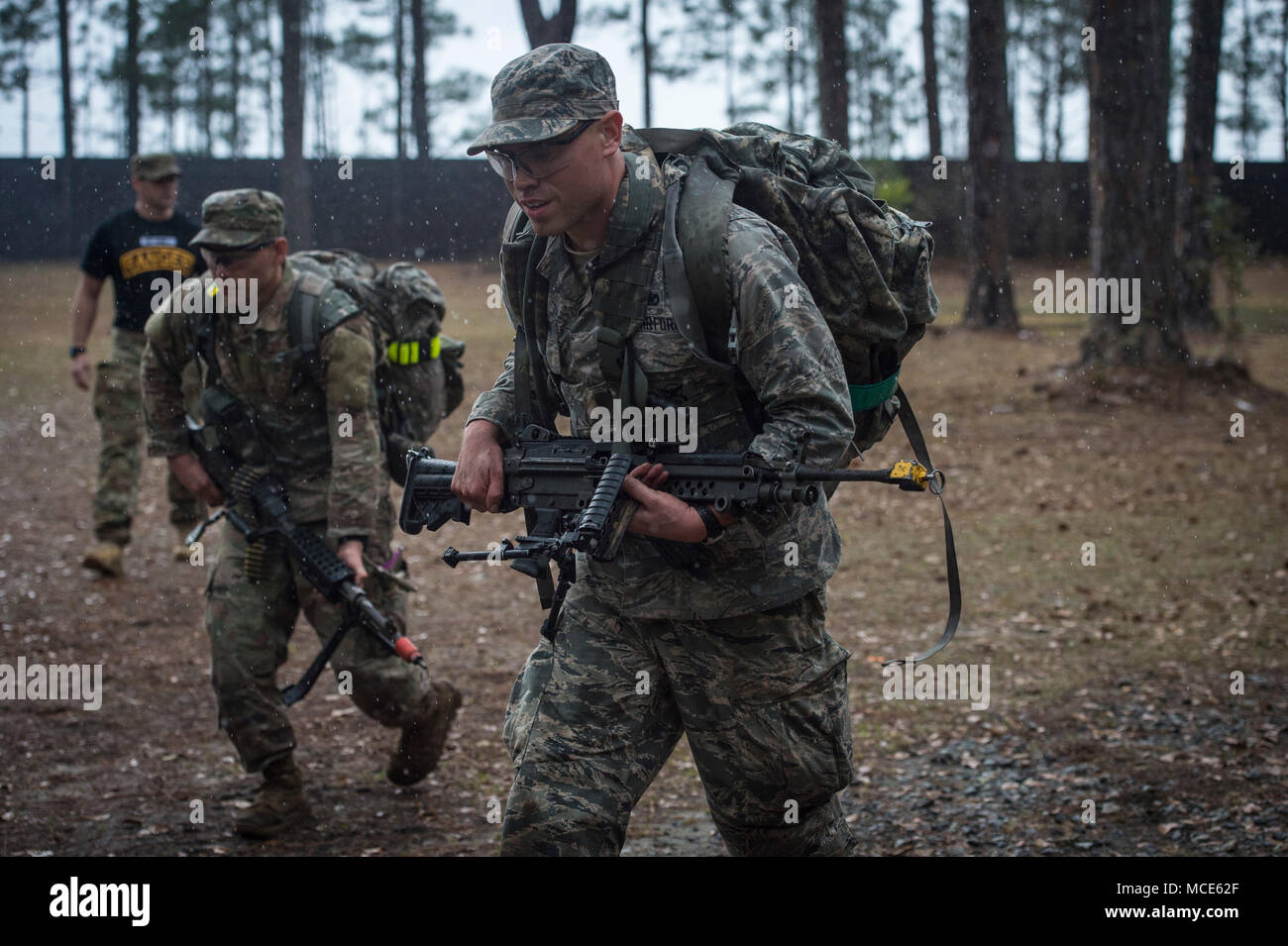 Airmen retreat during a Pre Ranger Assessment Course, Feb. 11, 2018, at ...
