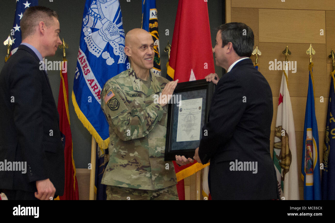 Maj. Gen. Kirk Vollmecke, center, the Program Executive Office for ...
