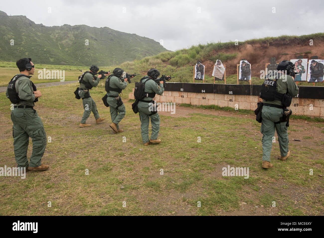 U.S. Marines and police officers with the Provost Marshal’s Office ...