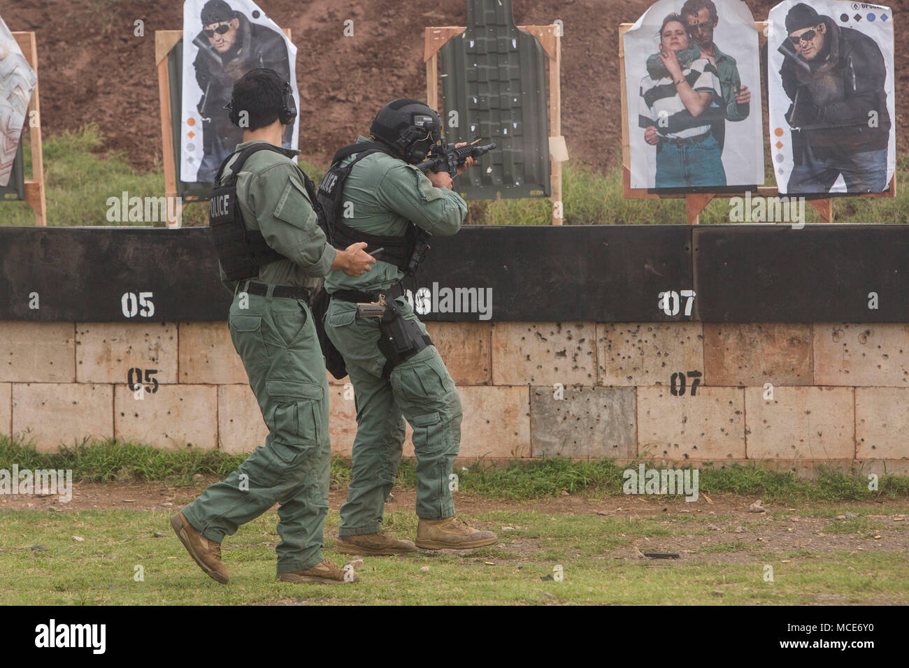 A U.S. Marine with the Provost Marshal’s Office Special Reaction Team ...
