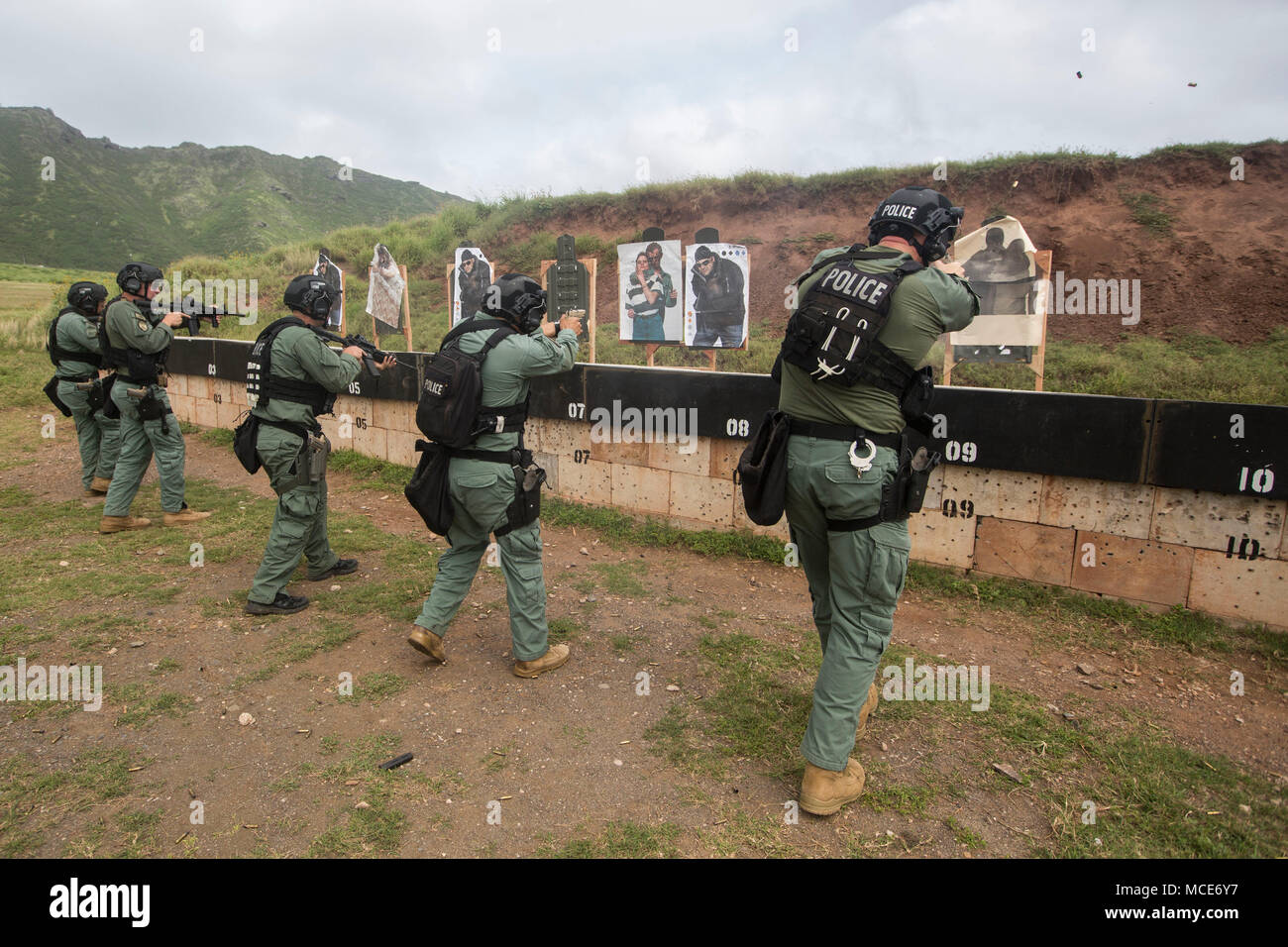 U.S. Marines and police officers with the Provost Marshal’s Office ...