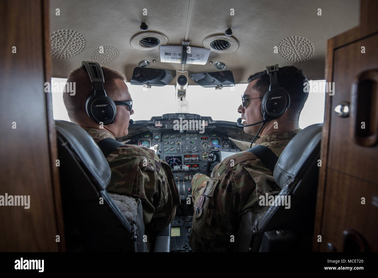 U.S. Air Force 1st Lt. Riley Snowden (left) and Capt. Ramiro Rios, C-21 ...