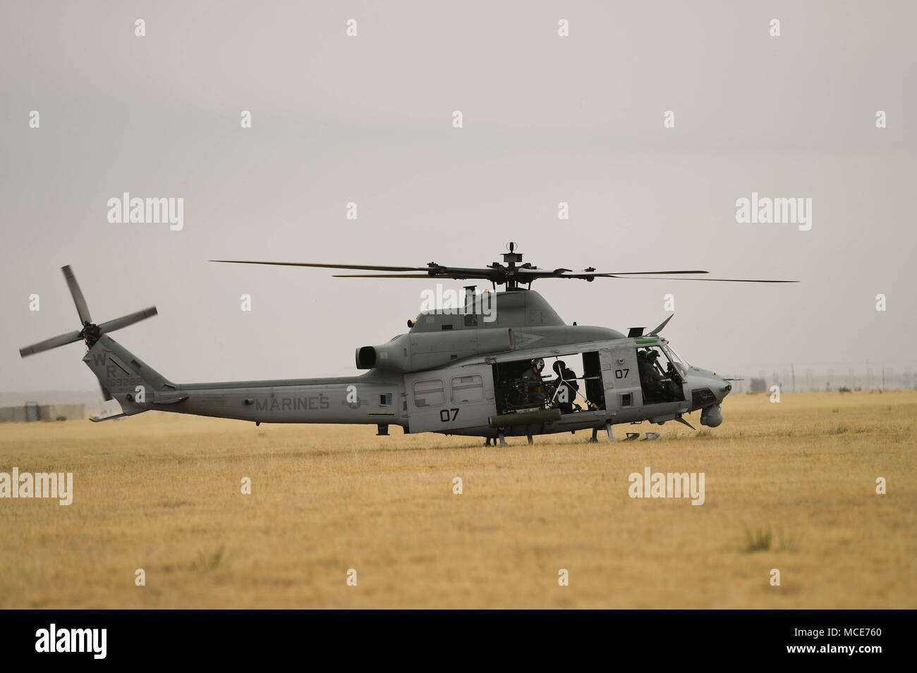 A U.S. Marine UH-61 Huey helicopter is boarded by NATO snipers, Feb. 27 ...