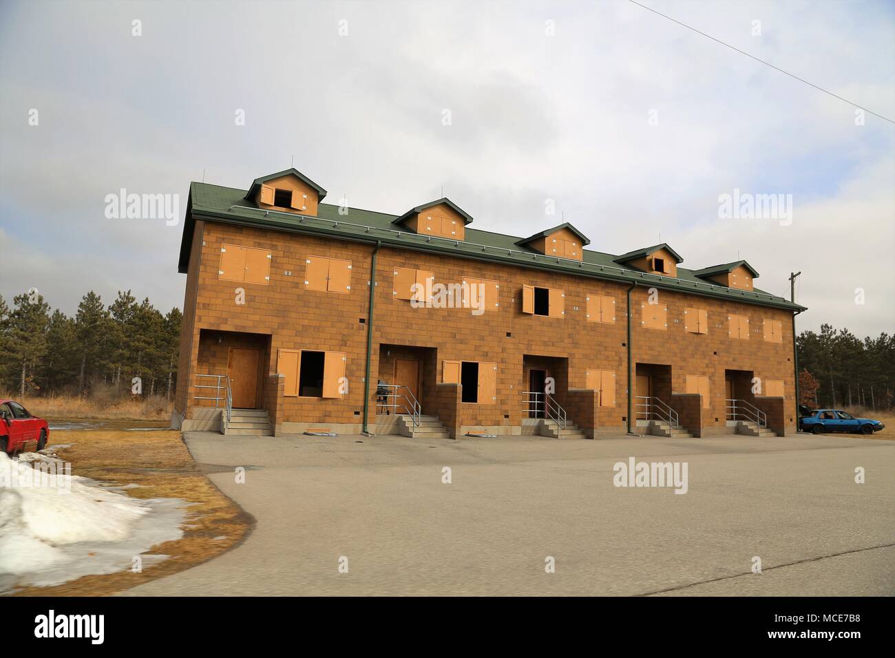 An exterior view of an area of the Fort McCoy Combined Arms Collective ...