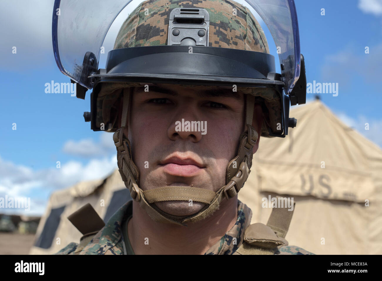 U.S. Marine Lance Cpl. Derek Booth, a military police Marine with 1st ...