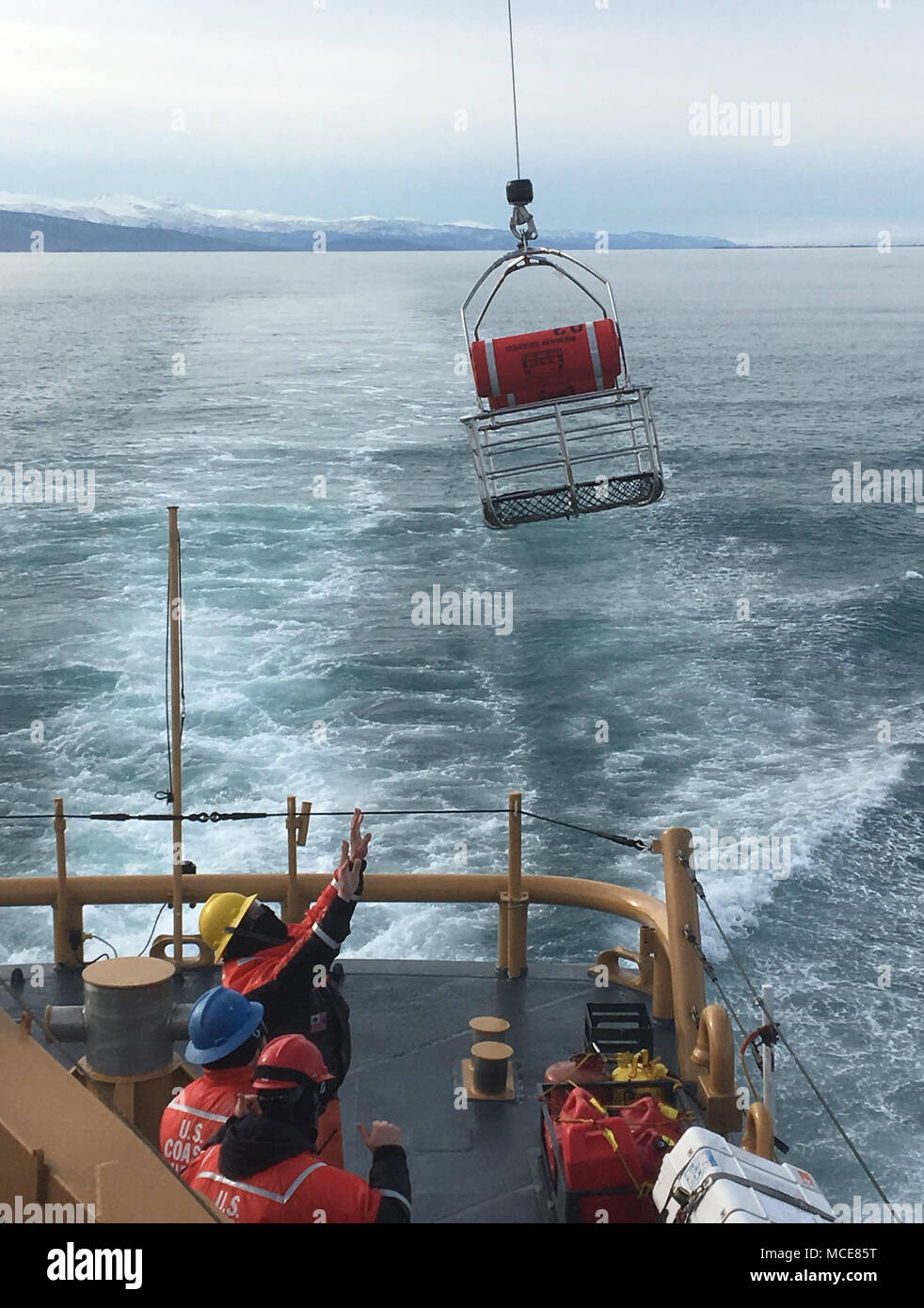 Coast Guard Cutter Naushon (WPB 1311) and crew conduct hoist training ...