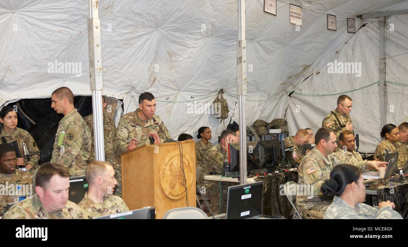 Maj. Jesus Pena, G3 Deputy Chief of Plans for the 13th ESC, conducts a ...