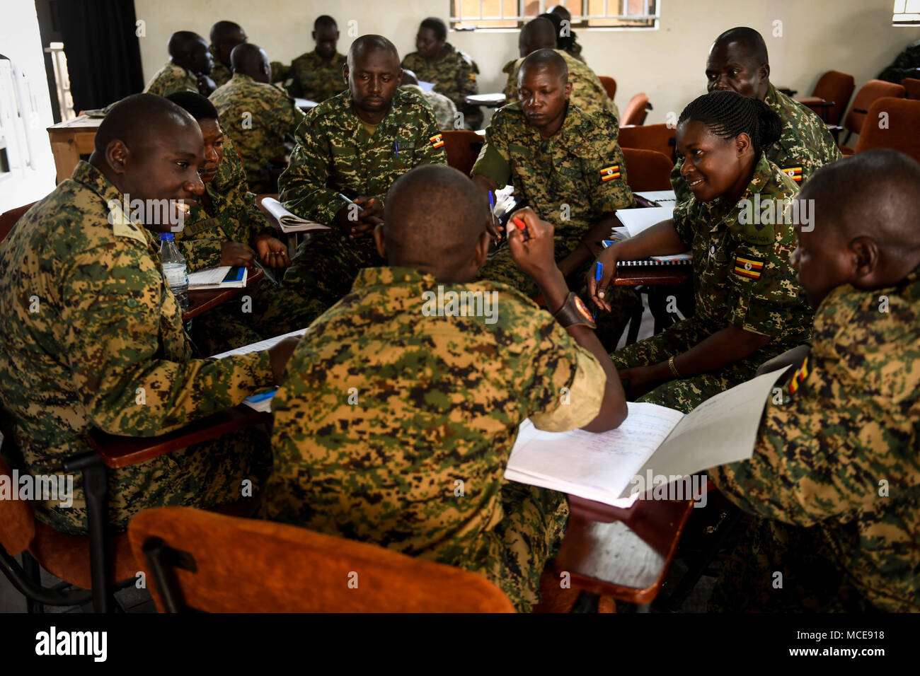 Ugandan People's Defense Force soldiers discuss the Civil Military ...