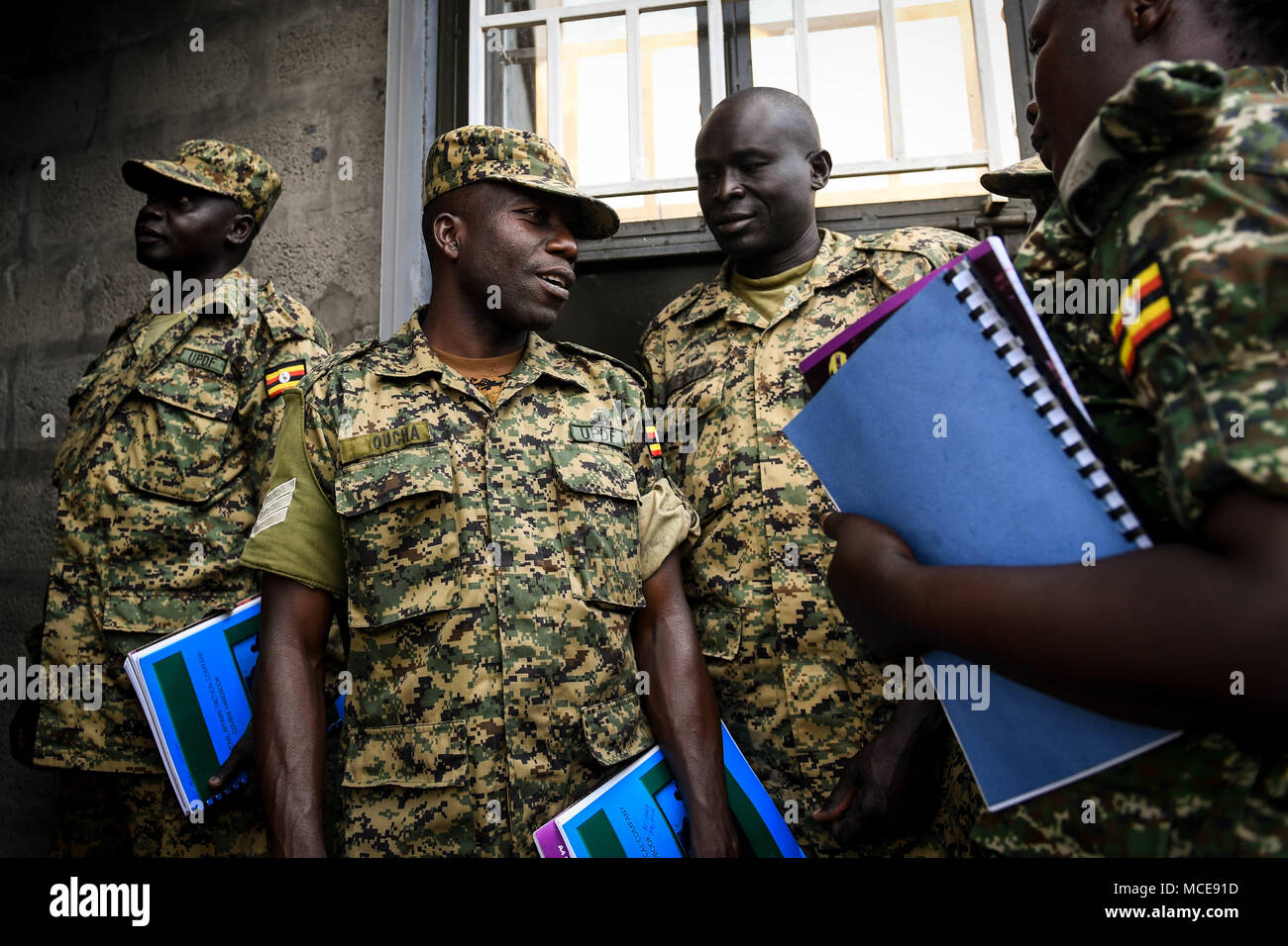 Ugandan People's Defense Force soldiers discuss the Civil Military ...
