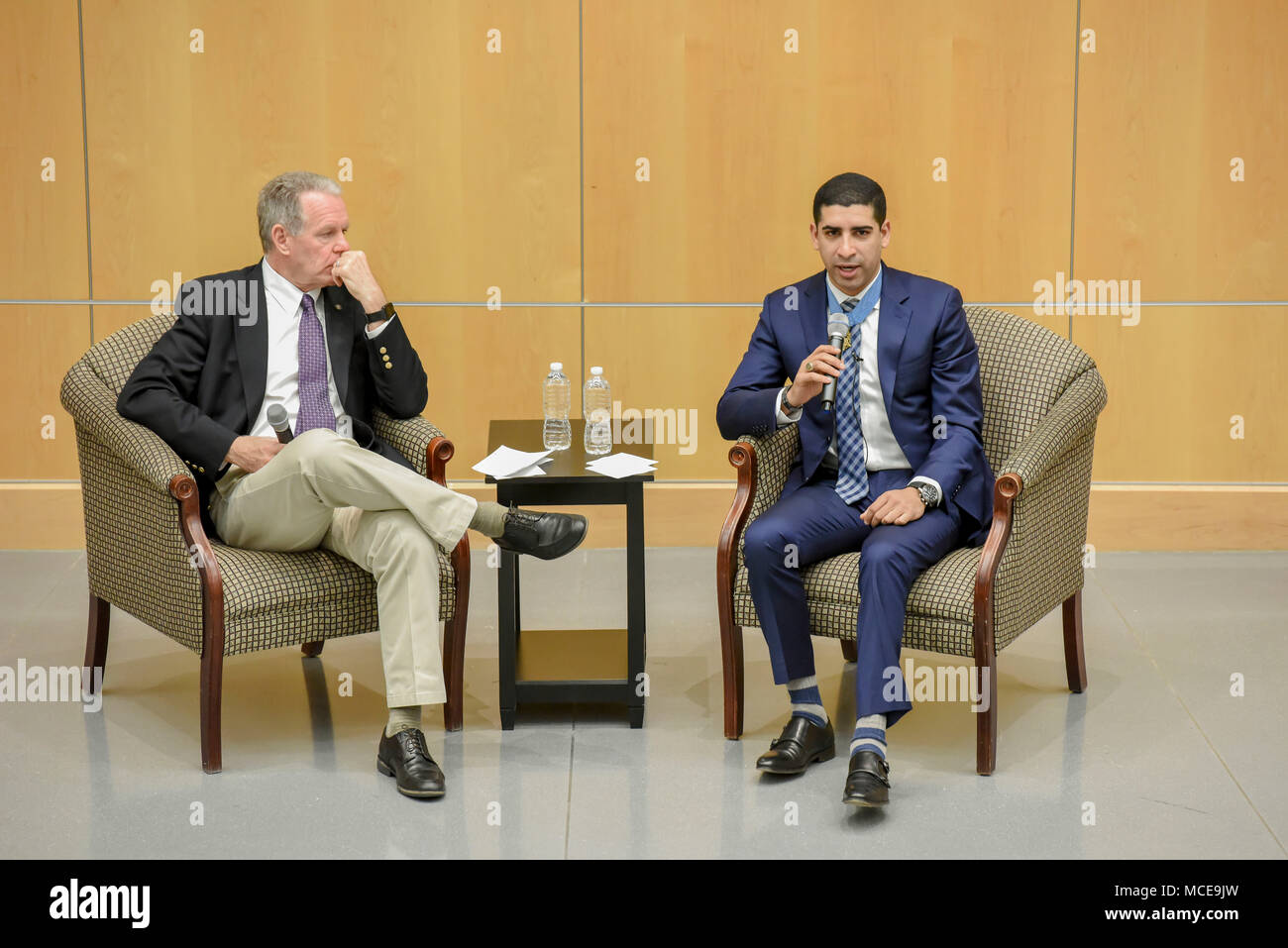 Medal of Honor winner retired Army Capt. Florent “Flo” Groberg, right ...