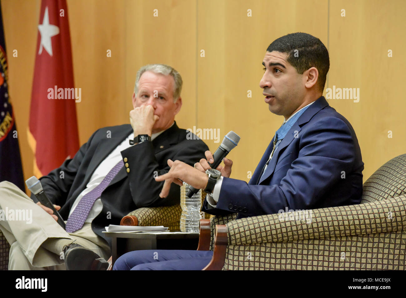 Medal of Honor winner retired Army Capt. Florent “Flo” Groberg, right ...