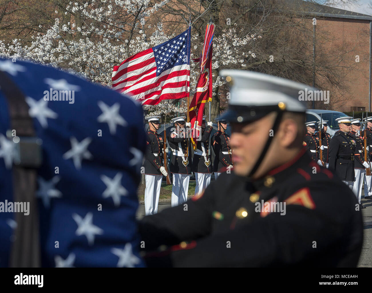The U.S. Marine Corps Color Guard presents the National Flag and Marine ...
