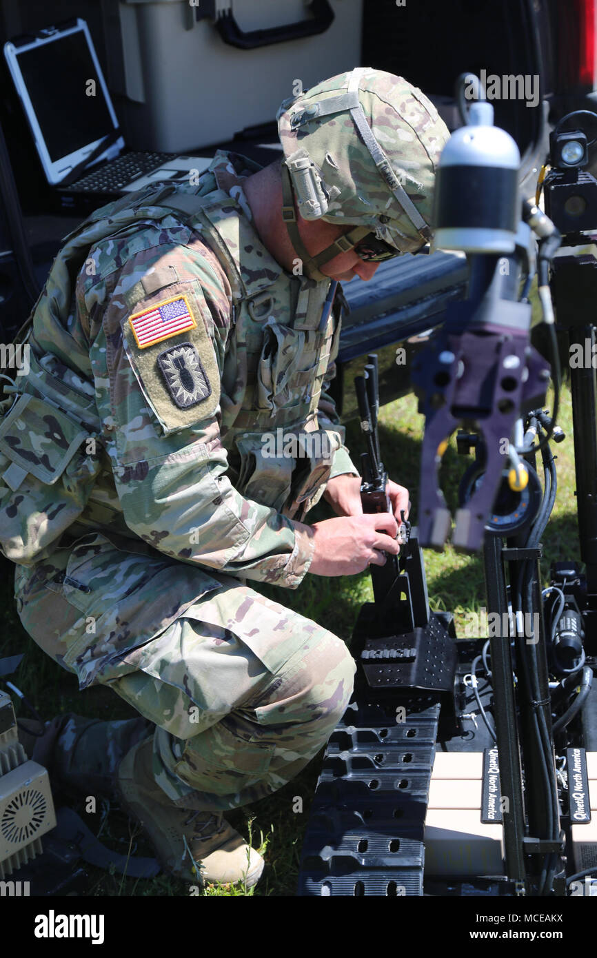 U.S. Army Staff Sgt. Thomas Clark, assigned to the 663d Ordnance Company Explosive Ordnance ...