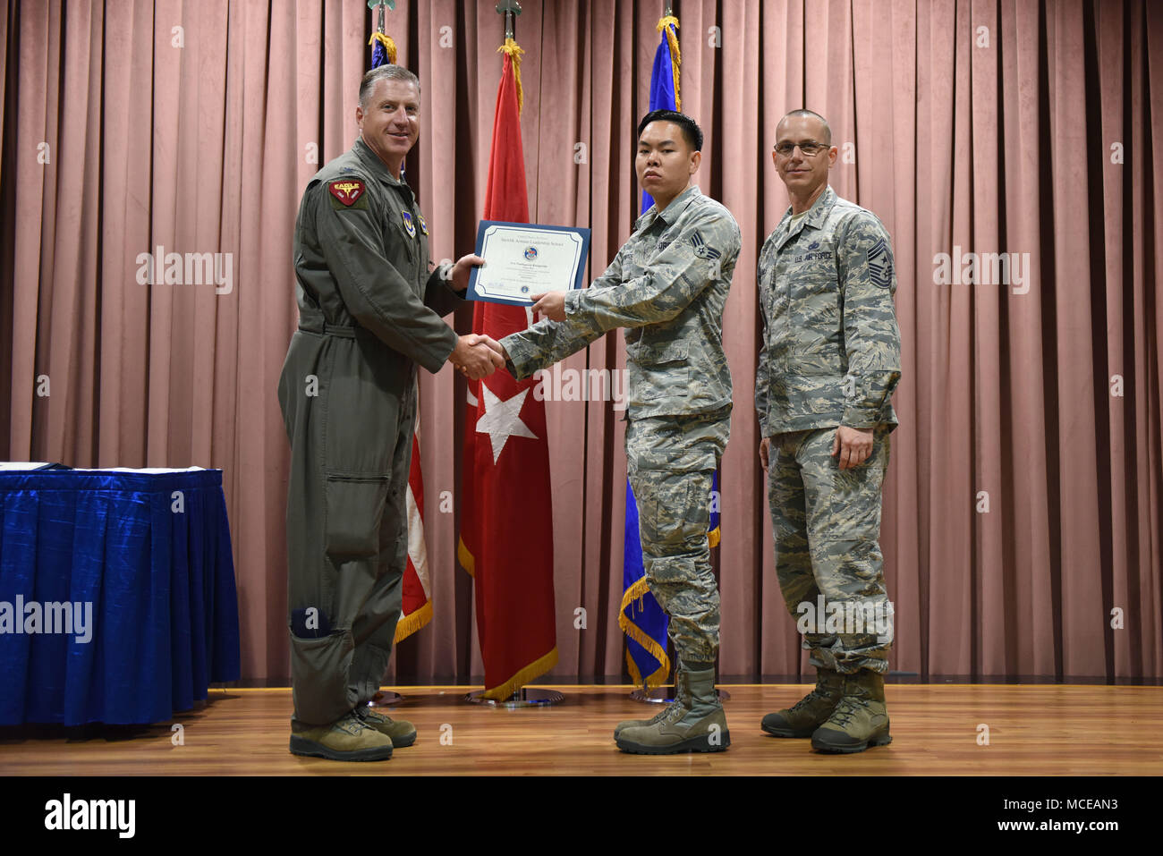 U.S. Air Force Airmen celebrate the graduation of Class Bravo from ...