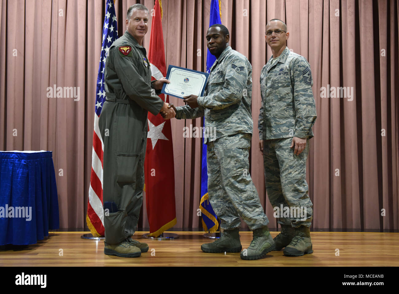 U.S. Air Force Airmen celebrate the graduation of Class Bravo from ...