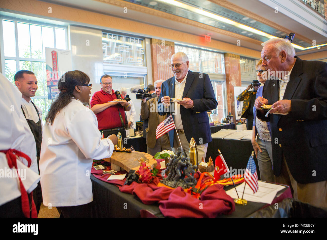 Beverly Boyd, protocol officer for Marine Forces Reserve, talks with ...