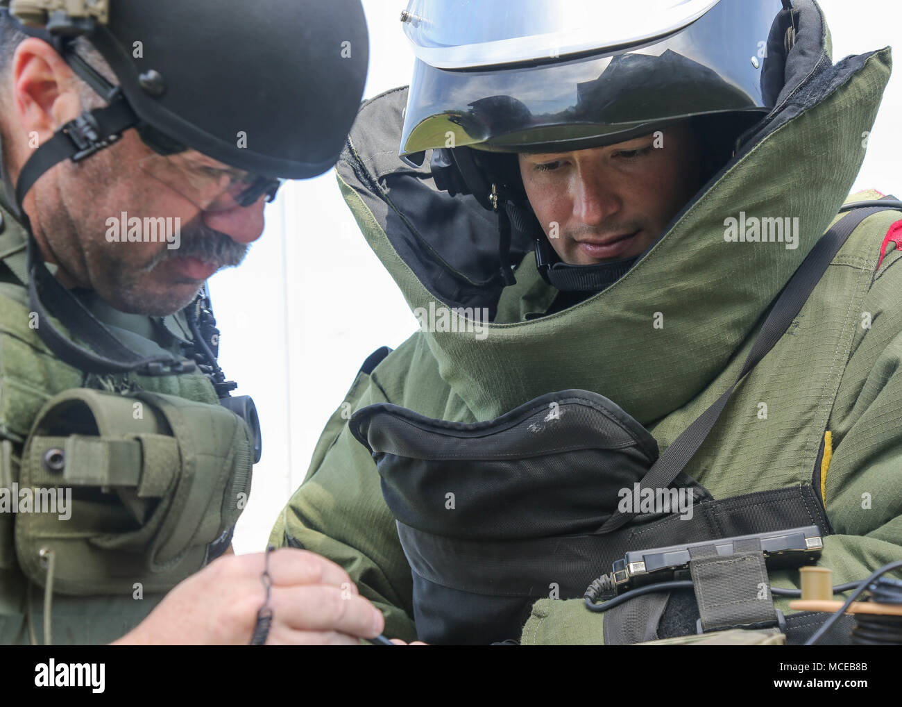 U.S. Army Staff Sgt. John Velasquez, 663D Ordnance Company EOD, 242D Ordnance Battalion EOD ...
