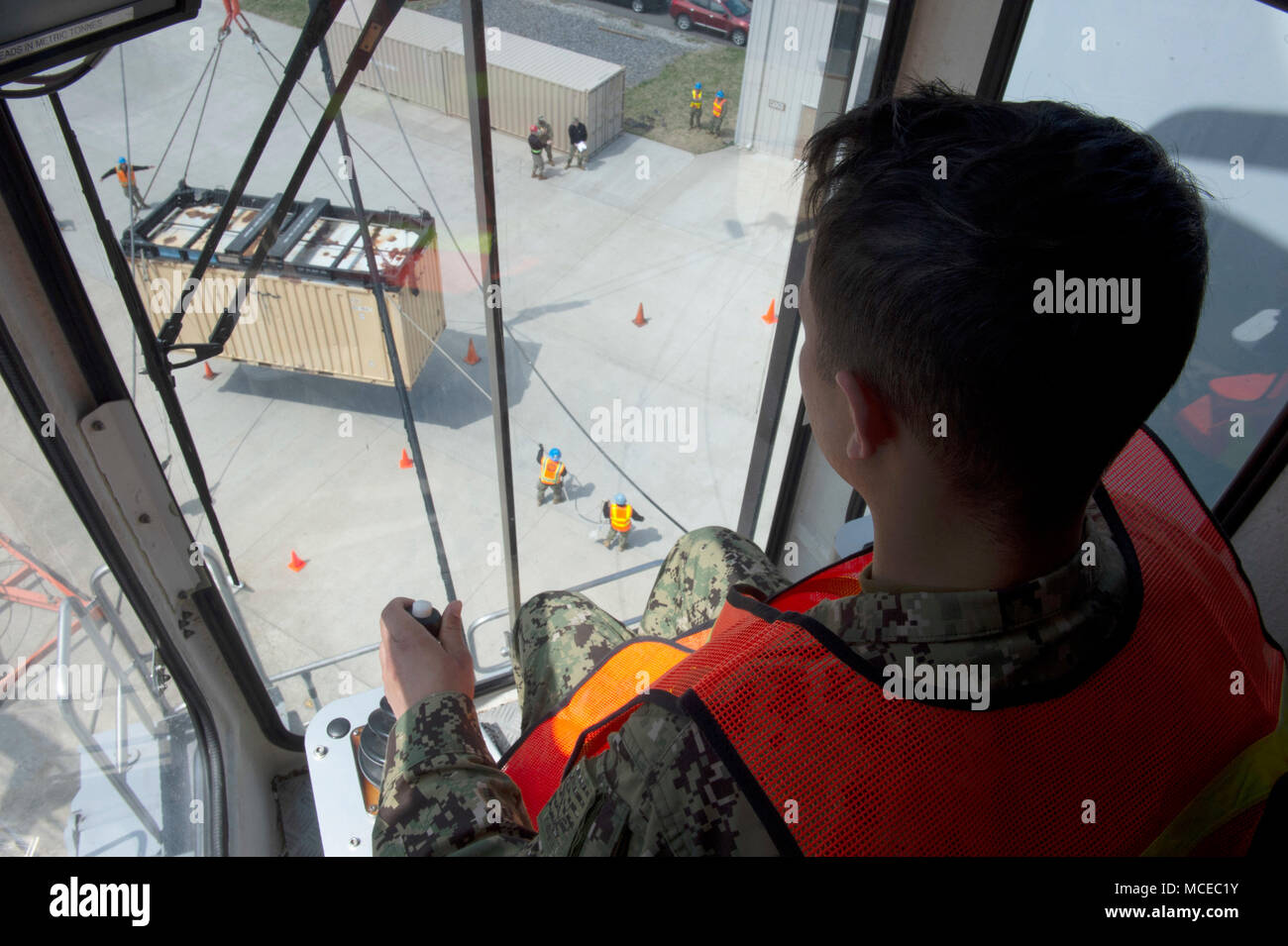 Ship's Serviceman 3rd class Jon Erik Delgado, assigned to Navy Cargo ...