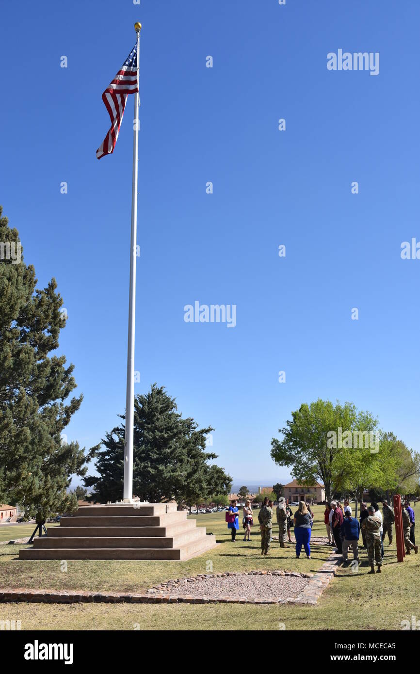 The U.S. Flag waves in the breeze, as Col. Whit Wright, garrison ...