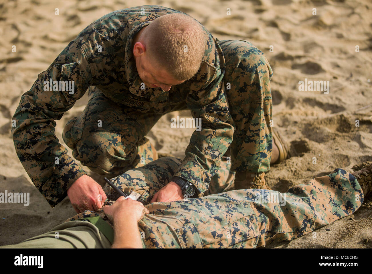 U.S. Marine Corps Pfc. Thomas Johnson, an assaultman with 1st Battalion, 3rd Marine Regiment ...