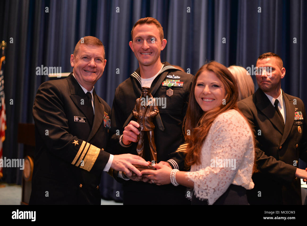 Engineman 1st Class Brandon Lovell, joined by his wife Amanda, is ...