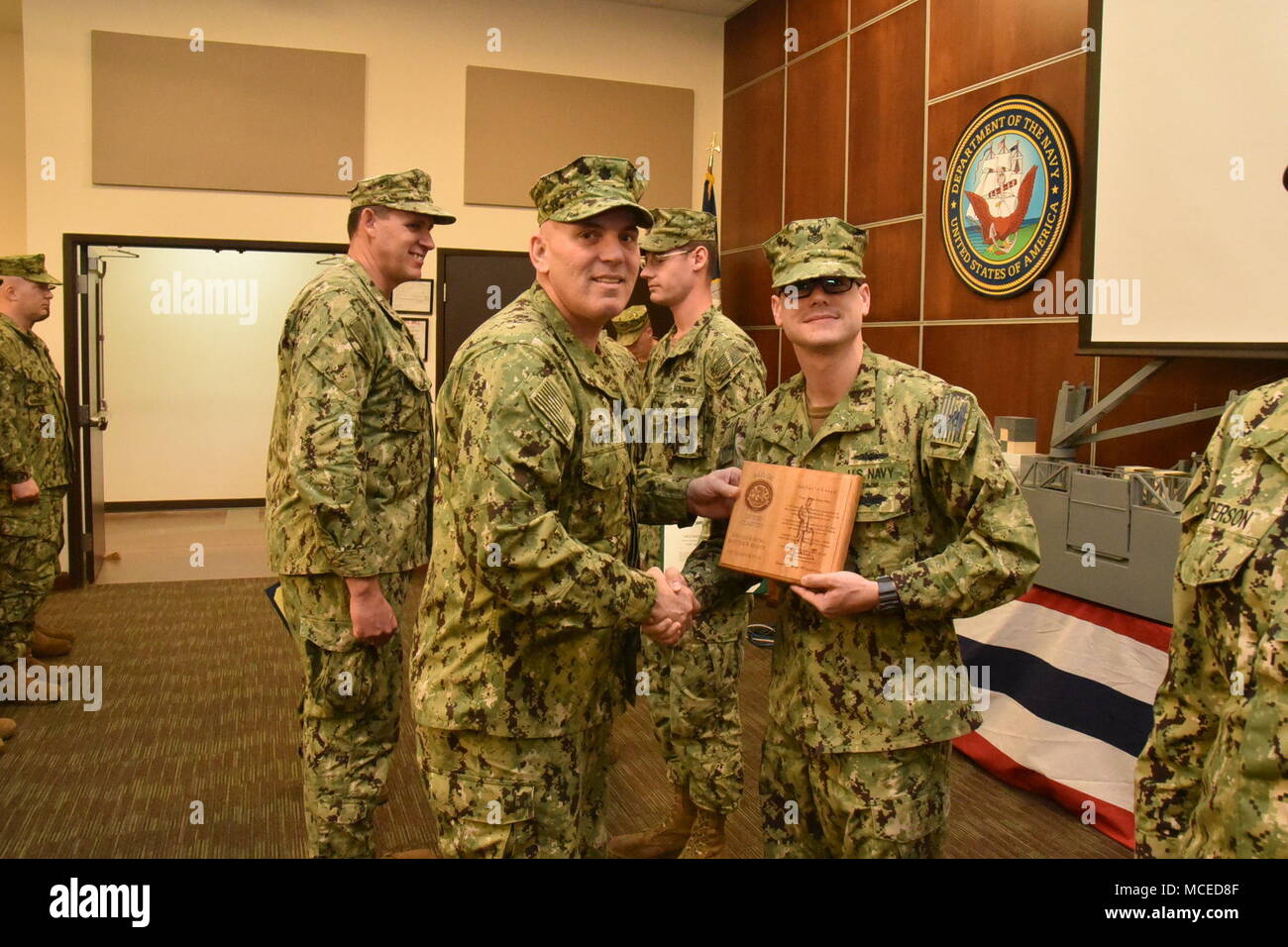 YN1 Kloos receives a Sailor of the Quarter plaque at All Hands on 13 ...