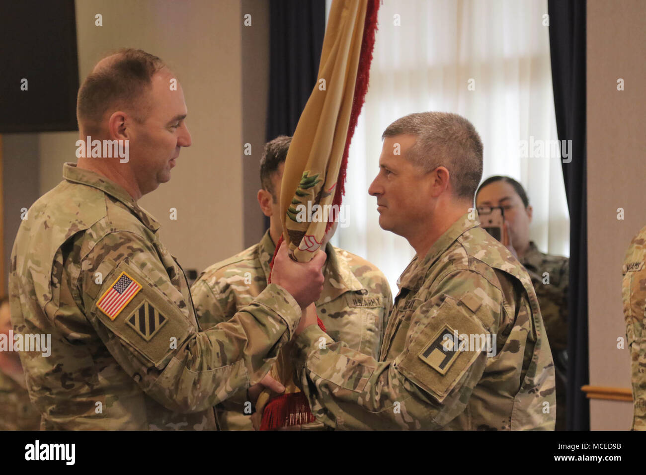 Col. James M. Schultze receives the unit colors for 1st Battalion ...