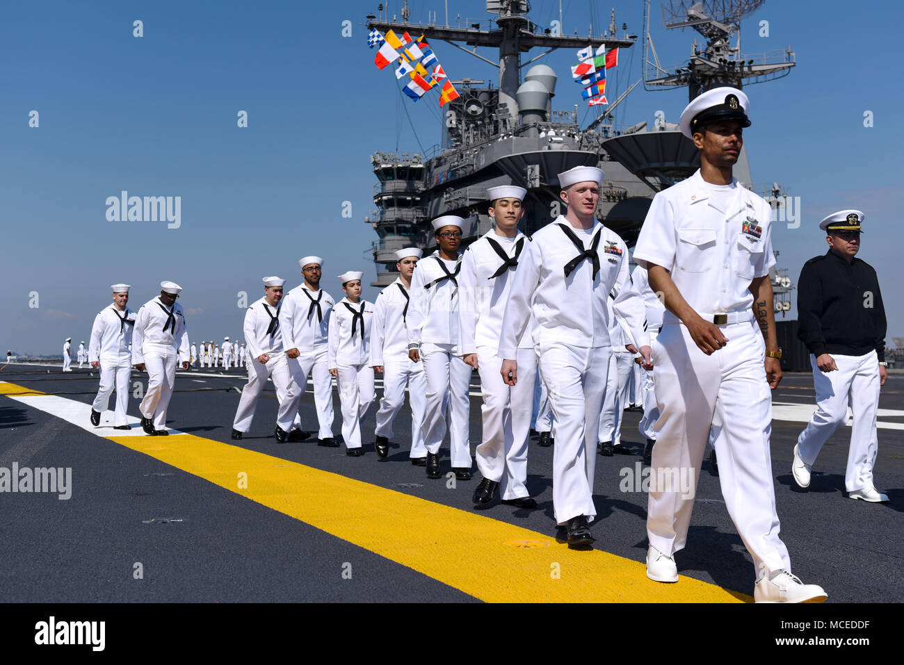 180411-N-NQ487-123 NORFOLK, Va. (Apr. 11, 2018) -- Sailors man the ...