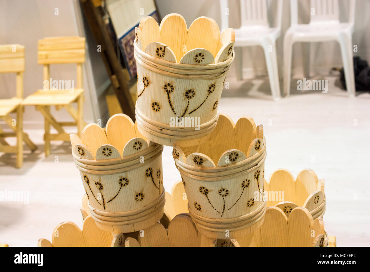 Set of buckets made of wood in a market place Stock Photo - Alamy