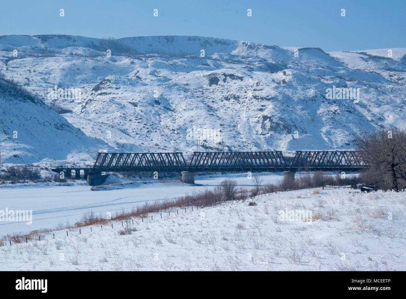 The wooden CPR Howe Truss bridge over the Red Deer River at East Coulee ...