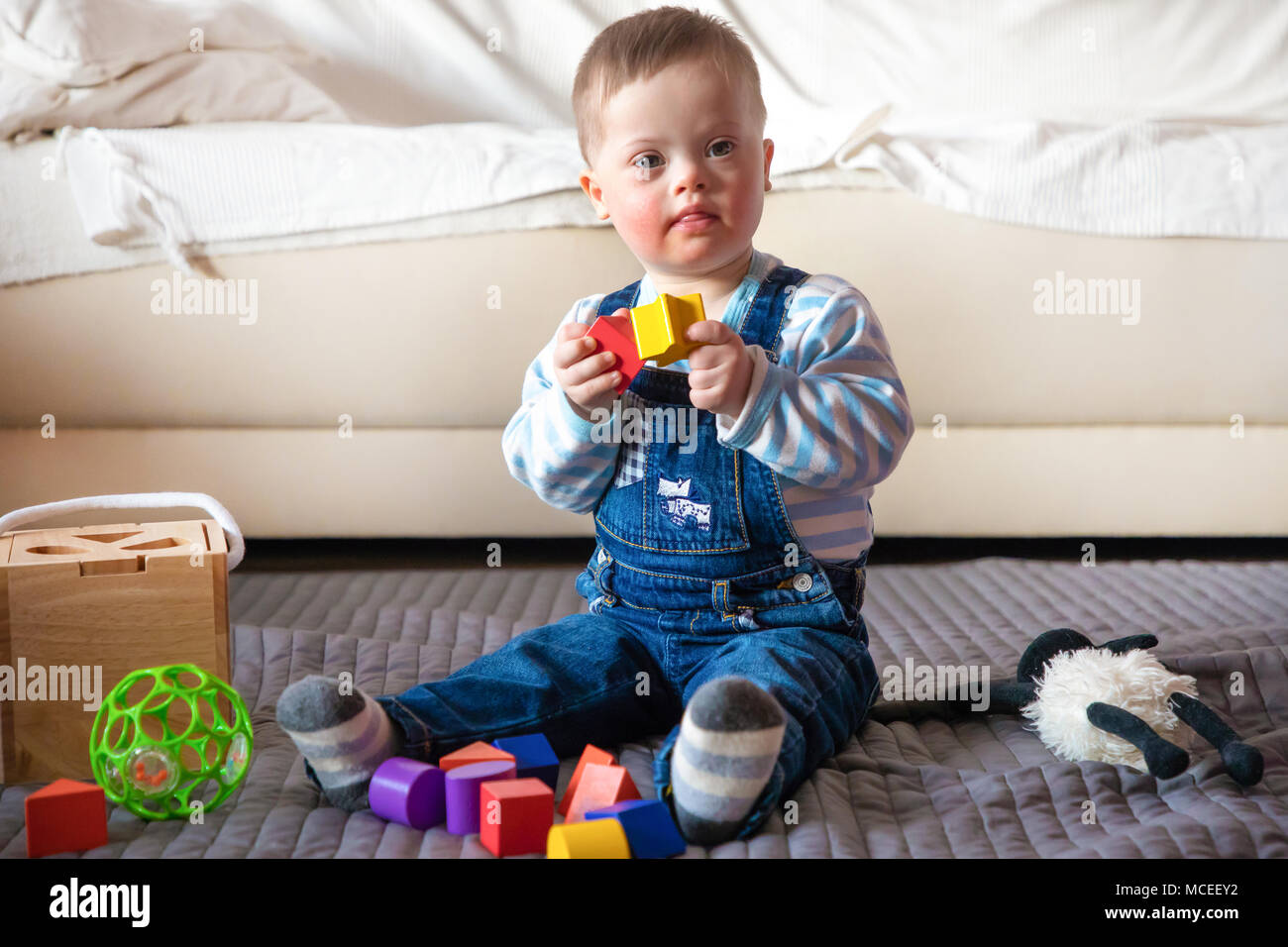 Portrait Of Cute Baby Boy With Down Syndrome Stock Photo Alamy portrait-of-cute-baby-boy-with-down-syndrome-stock-photo-alamy