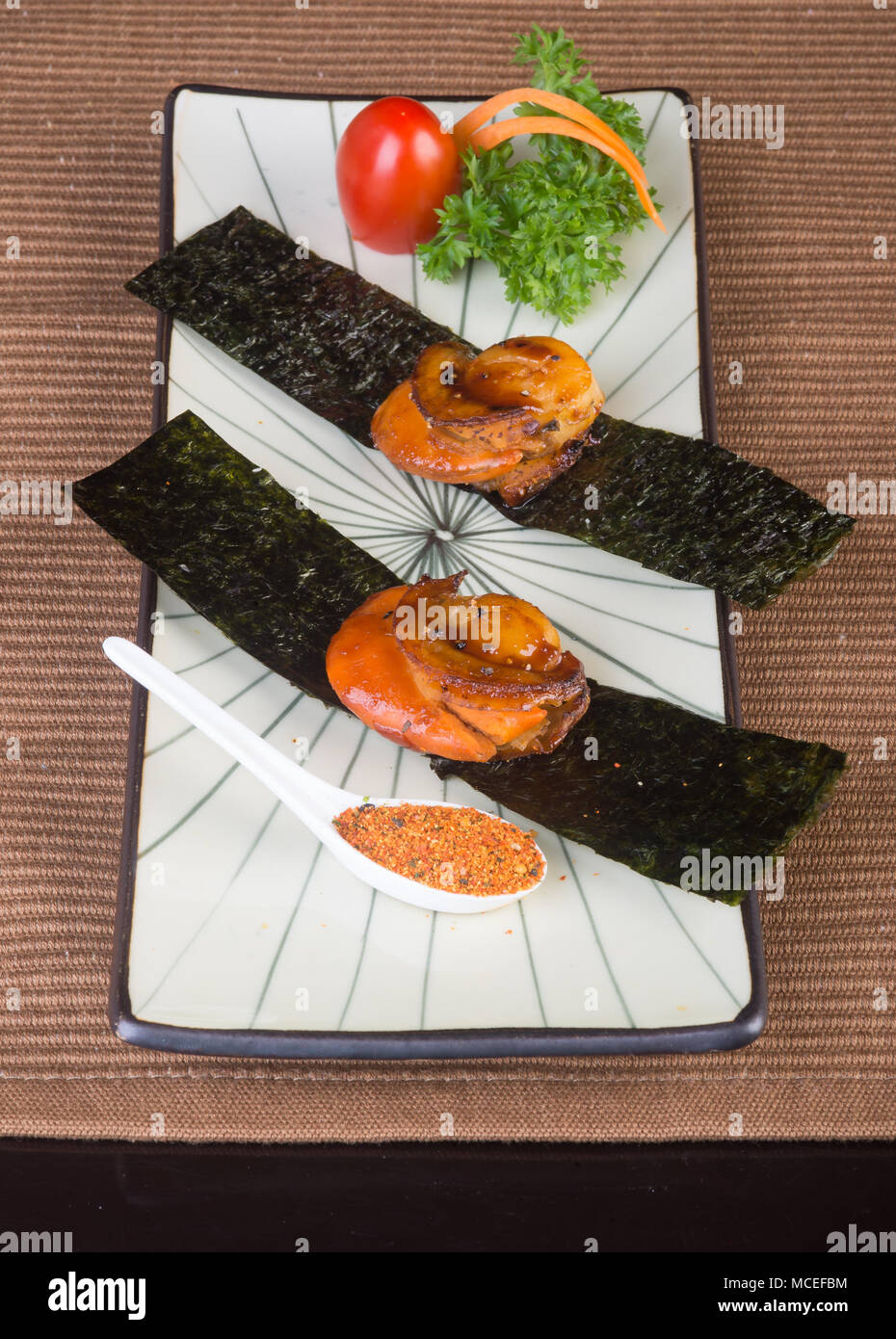 japanese cuisine. grilled shell fish on background Stock Photo - Alamy